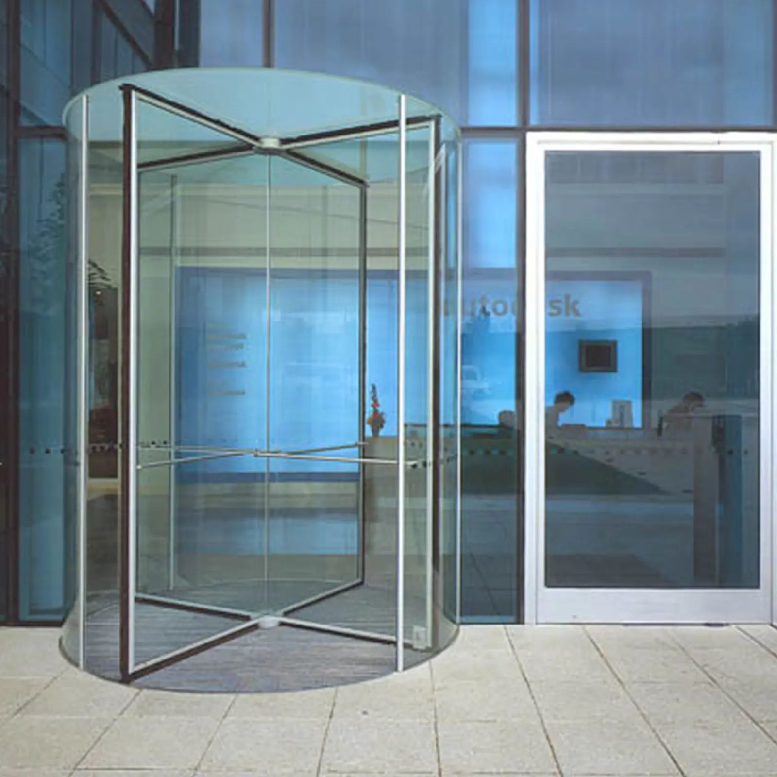 Minimalist all-glass Oversized Revolving Doors Case Study: Revolving ...